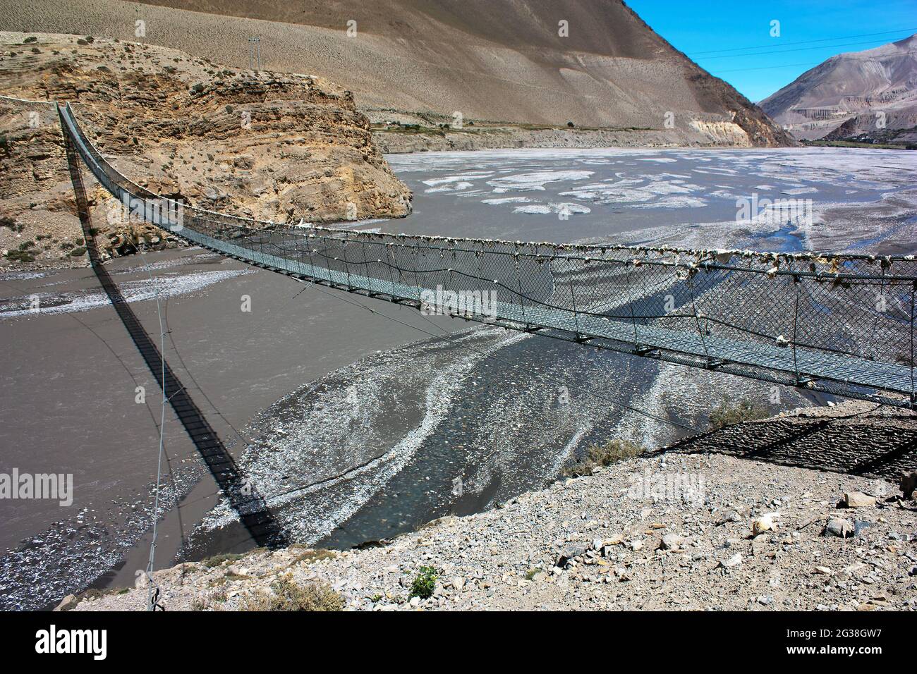 rope hanging suspension bridge above Kali Gandaki Nadi River between ...