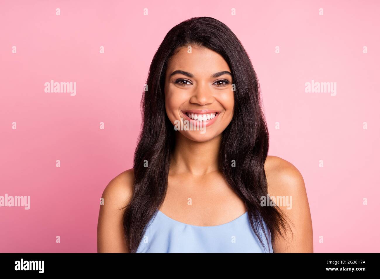Portrait Of Optimistic Brunette Lady Wear Blue Top Isolated On Pastel