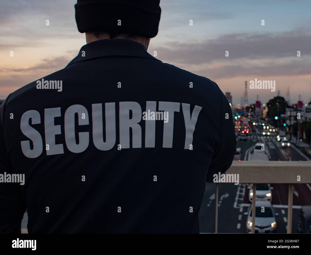 Security guard looking down street hi-res stock photography and images ...