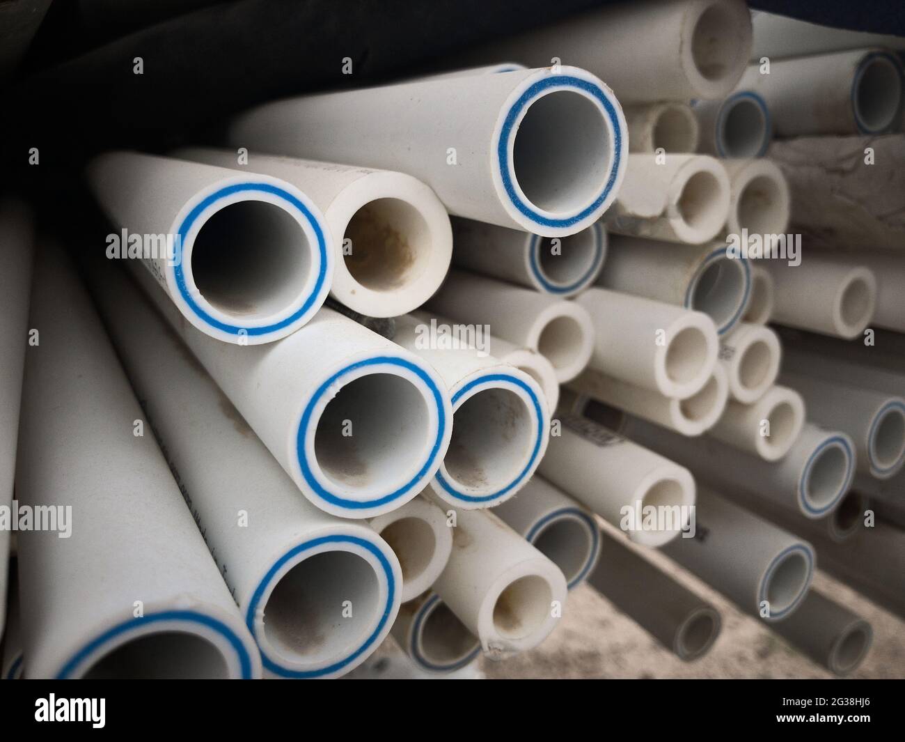 Stack of plastic LDPE water pipes Stock Photo - Alamy