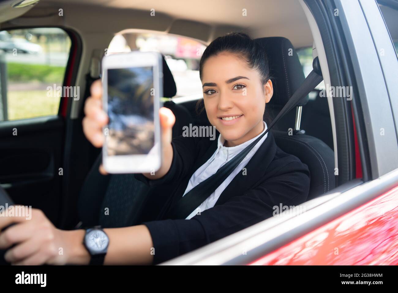 Woman showing something on hi-res stock photography and images - Alamy