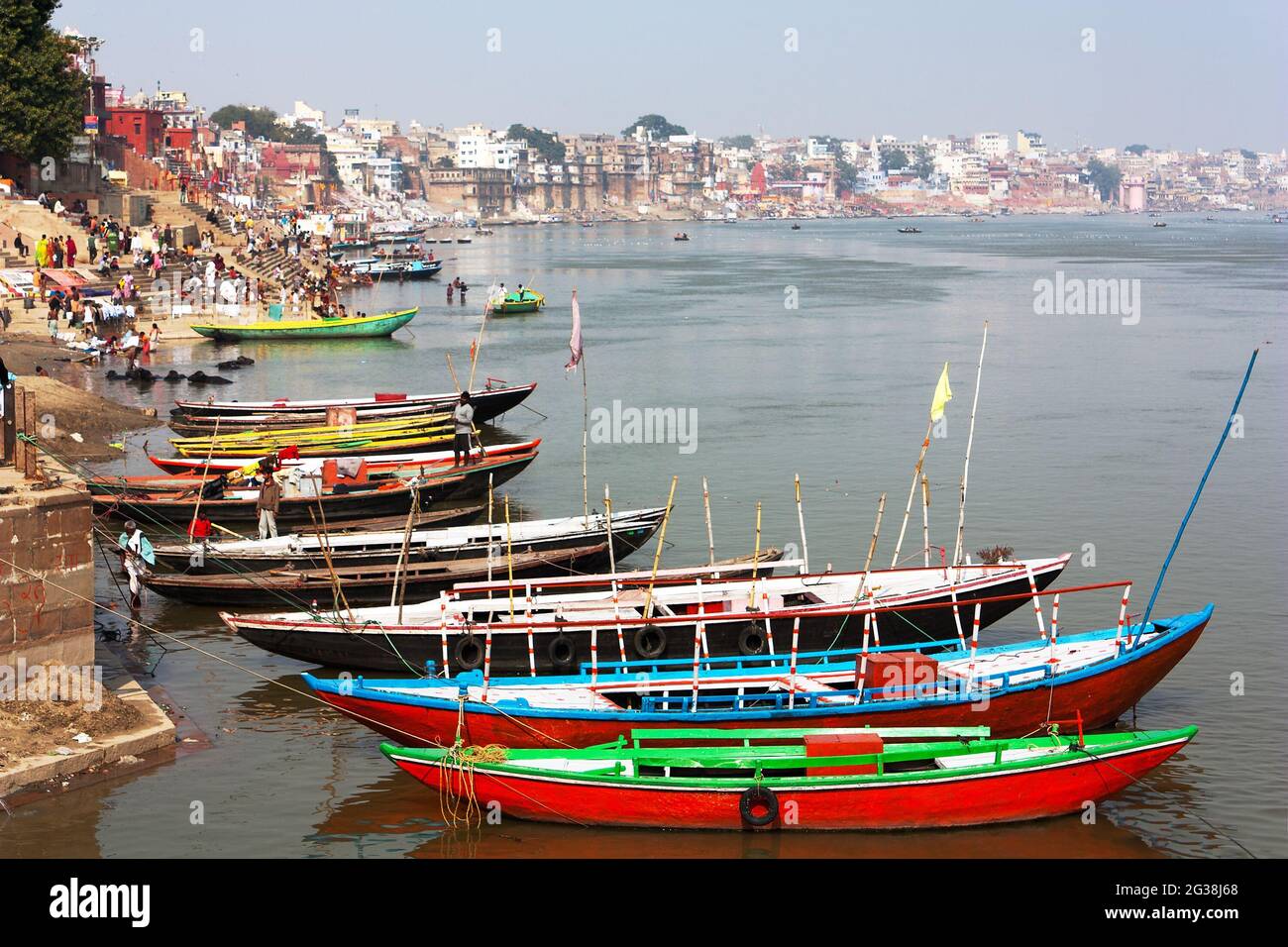 View of Varanasi with boats on sacred Ganga River - Uttar Pradesh ...