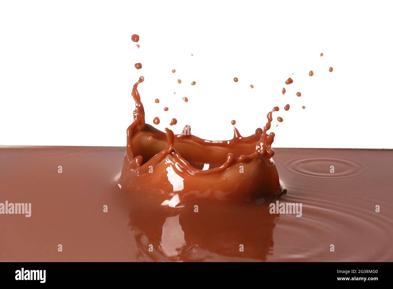 Splash of hot chocolate on white background Stock Photo - Alamy