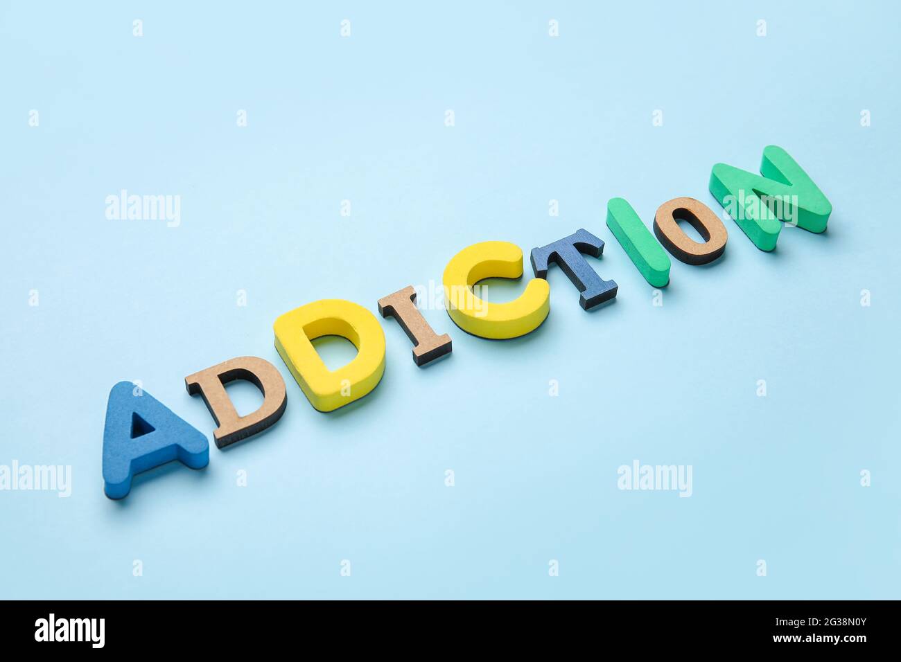 Word ADDICTION on color background Stock Photo - Alamy