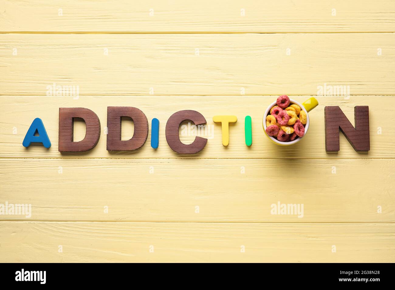 Word ADDICTION and food on wooden background Stock Photo - Alamy