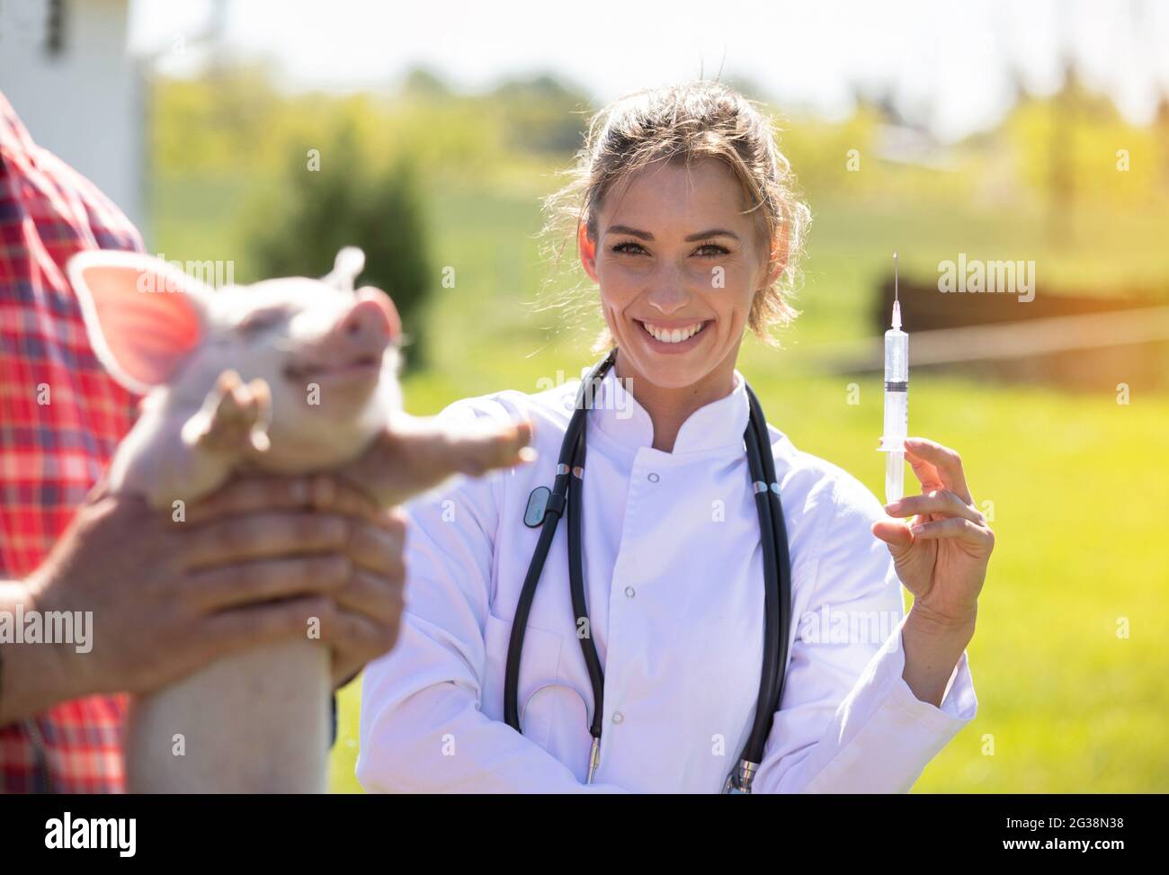 Woman wearing lab coat hi-res stock photography and images - Alamy
