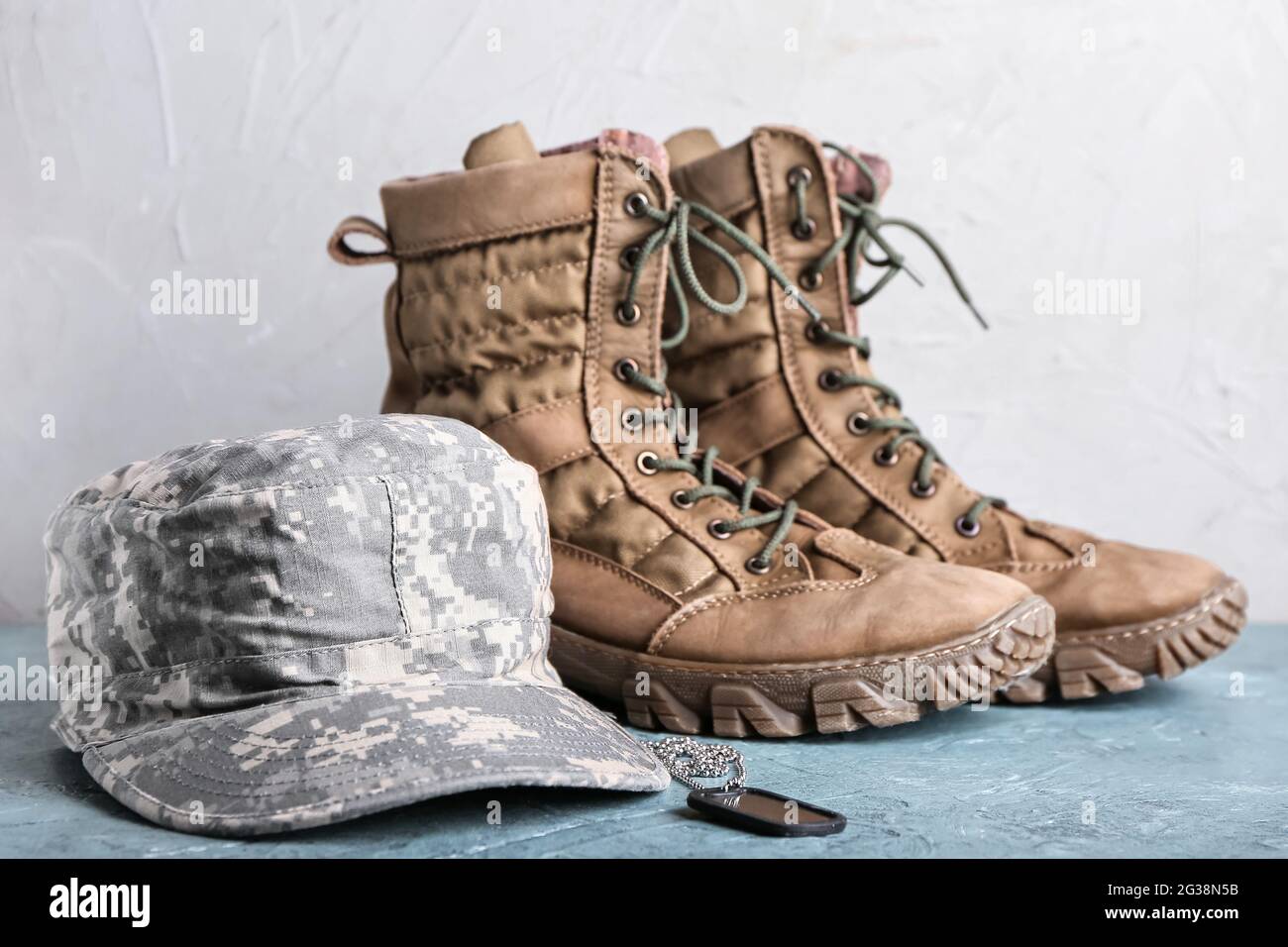 Military uniform on grunge background Stock Photo - Alamy