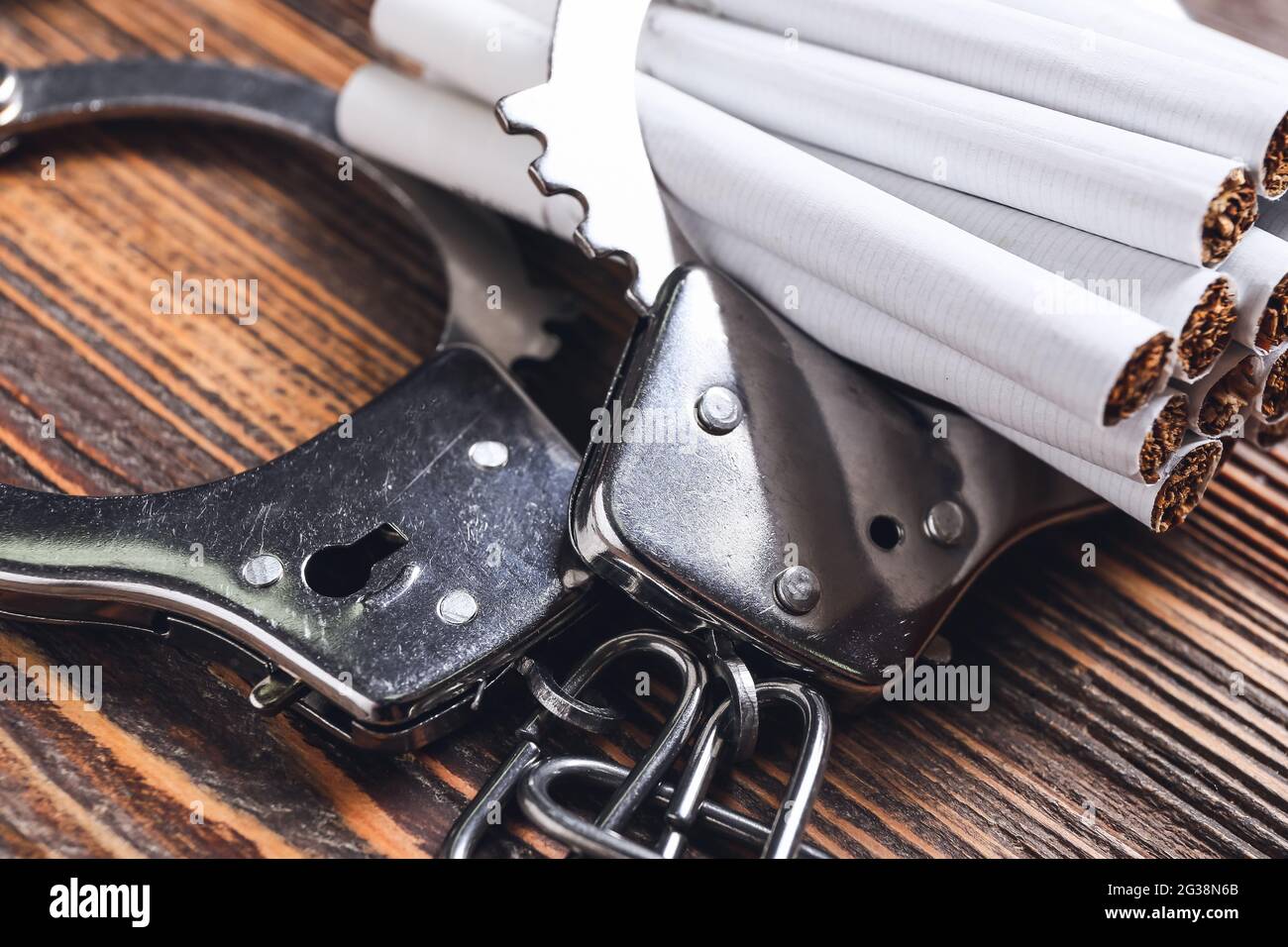 Addiction concept cigarettes handcuffs hi-res stock photography and ...
