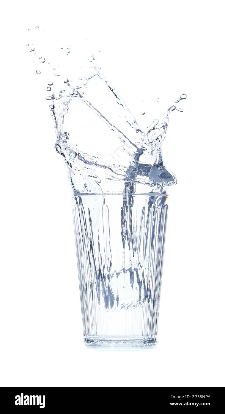 Glass of water with splash on white background Stock Photo - Alamy
