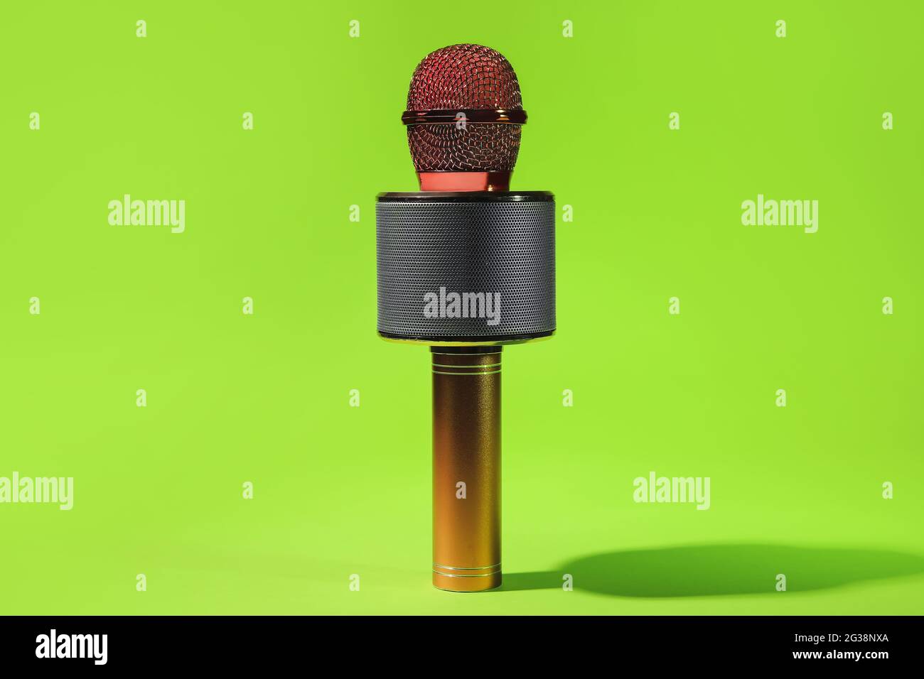 Modern microphone on color background Stock Photo - Alamy