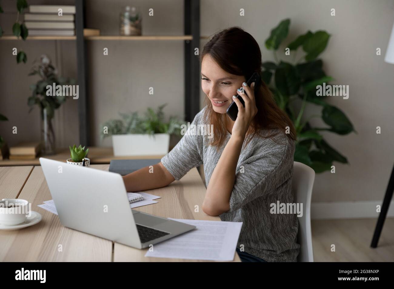 Woman laptop smartphone making hi-res stock photography and images - Alamy