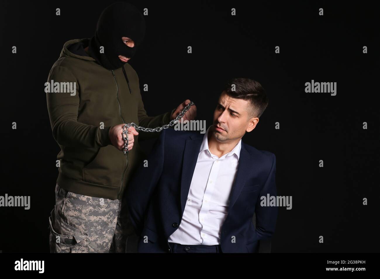 Male terrorist sitting on hi-res stock photography and images - Alamy
