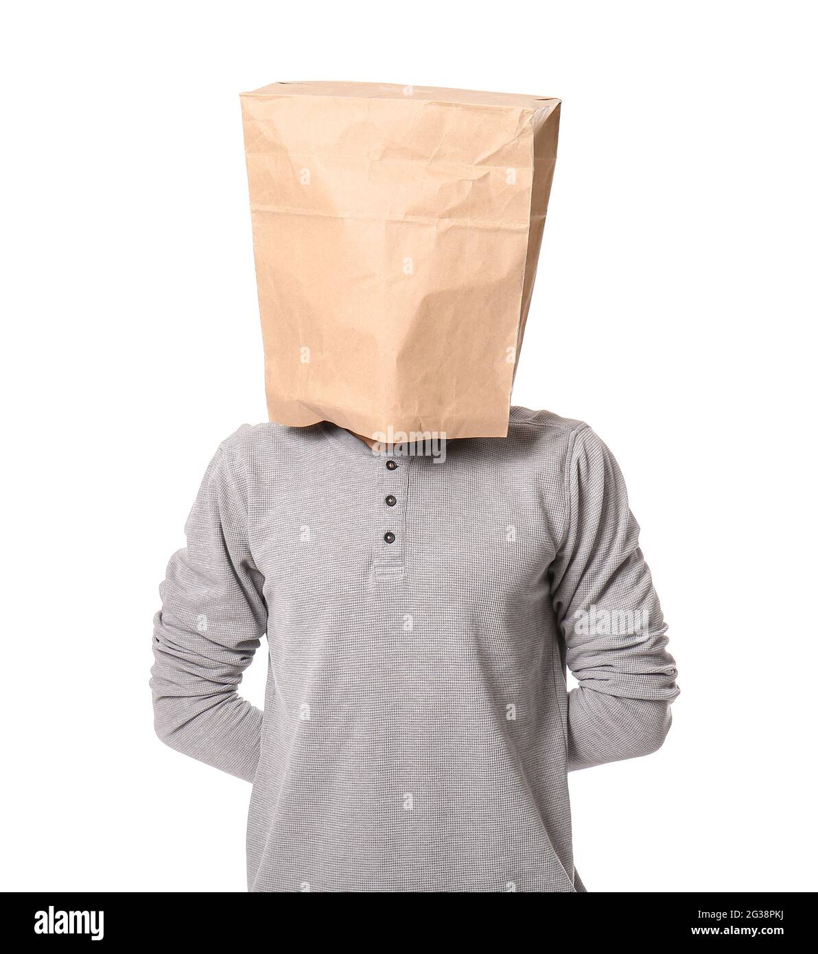 Male hostage with paper bag on white background Stock Photo - Alamy