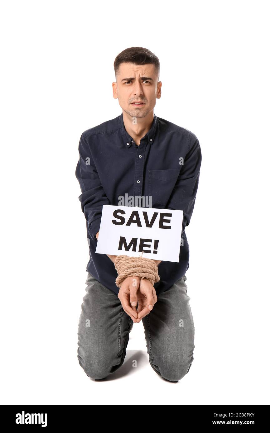Male hostage and paper with text SAVE ME on white background Stock ...
