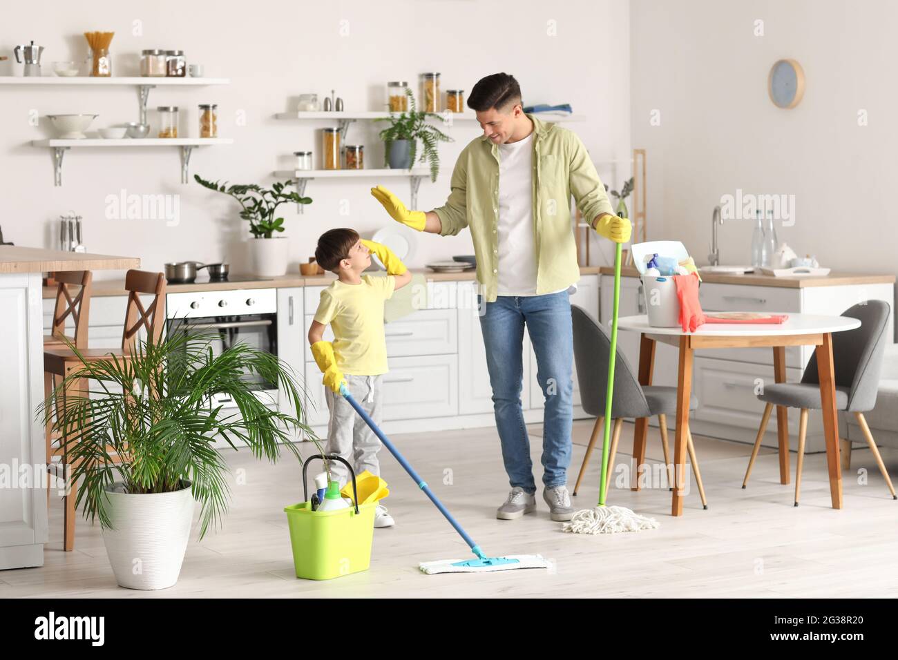 Mopping floor child hi-res stock photography and images - Alamy