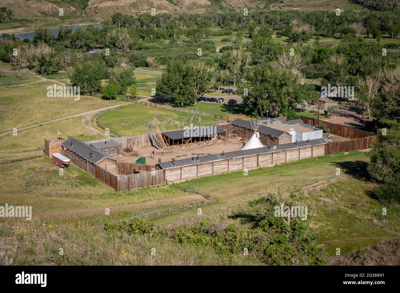Lethbridge's Fort Whoop-up in summer with rail viaduct in the ...