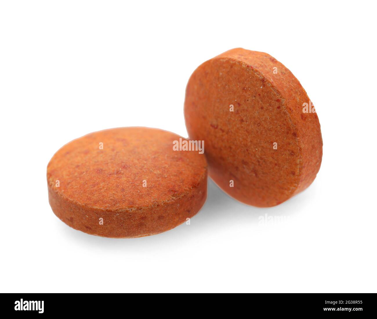 Color pills on white background Stock Photo - Alamy