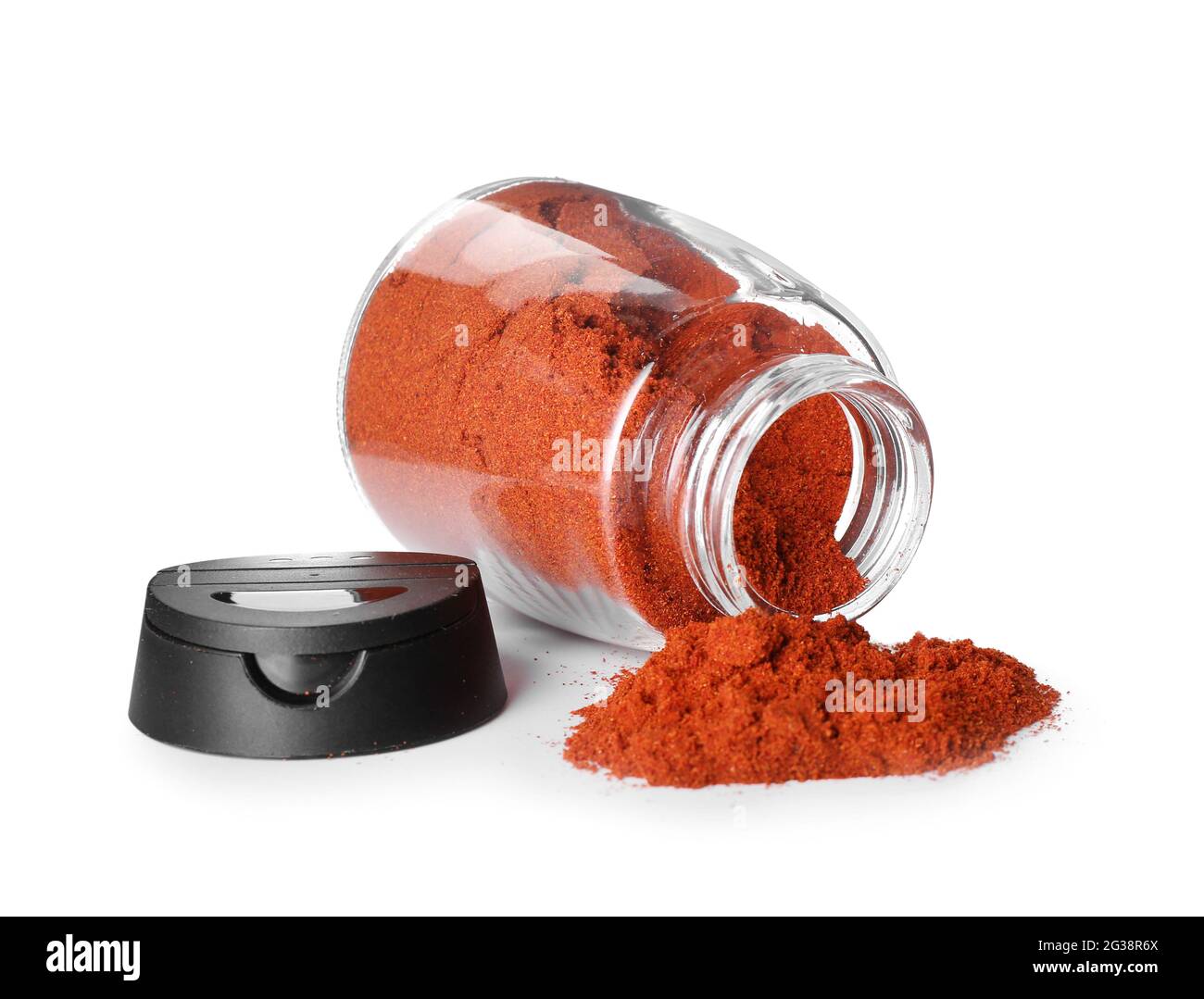 Jar with red pepper powder on white background Stock Photo - Alamy