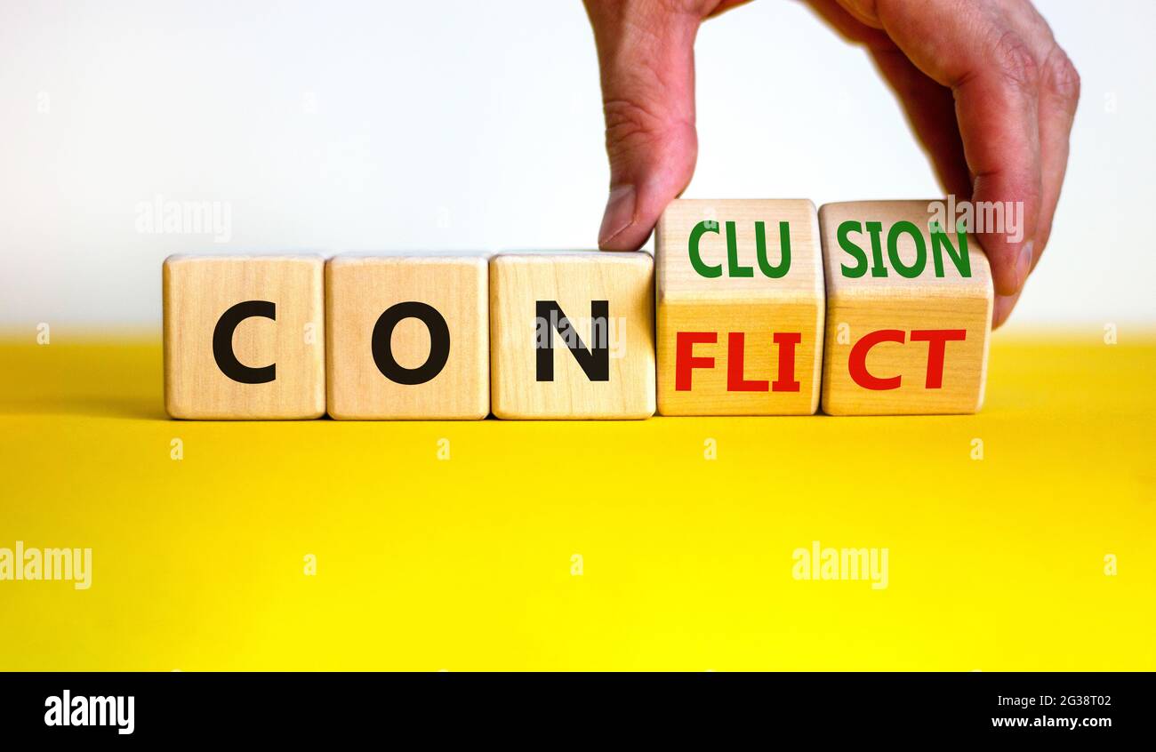 Conflict or conclusion symbol. Businessman turns wooden cubes, changes ...