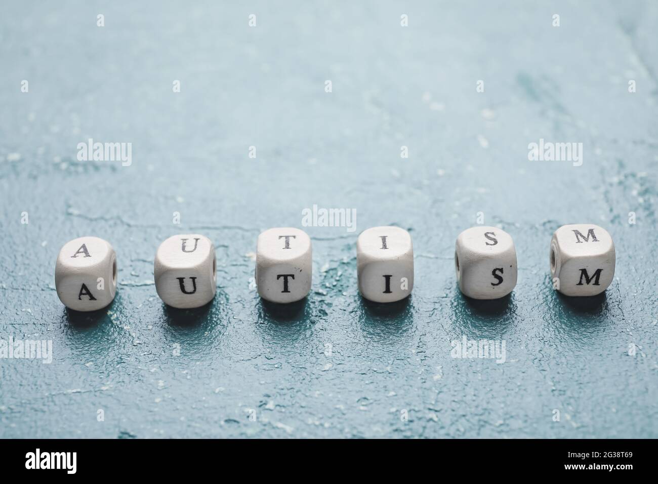 Child cubes word autism hi-res stock photography and images - Alamy