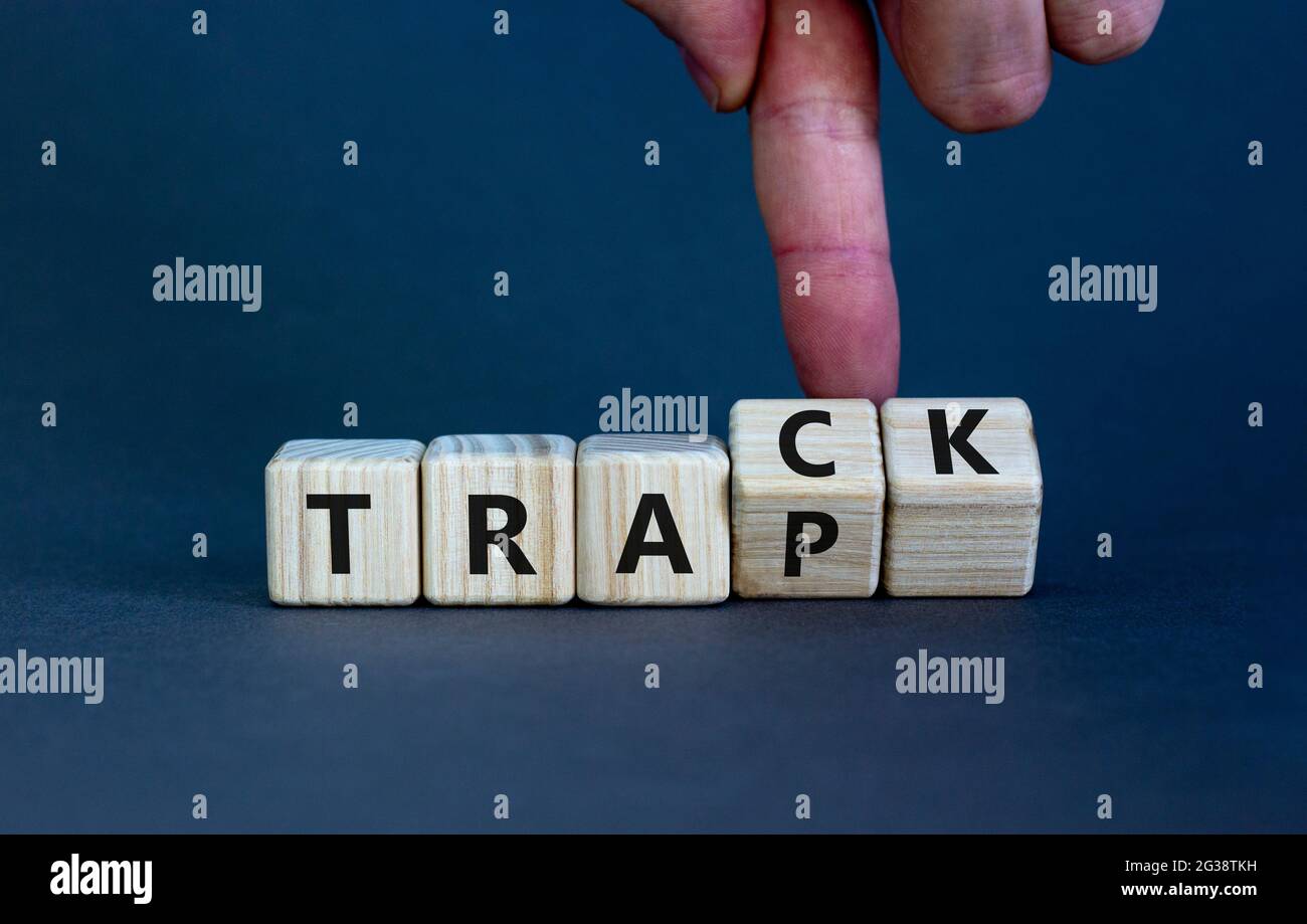 Trap or track symbol. Businessman turns wooden cubes and changes the ...