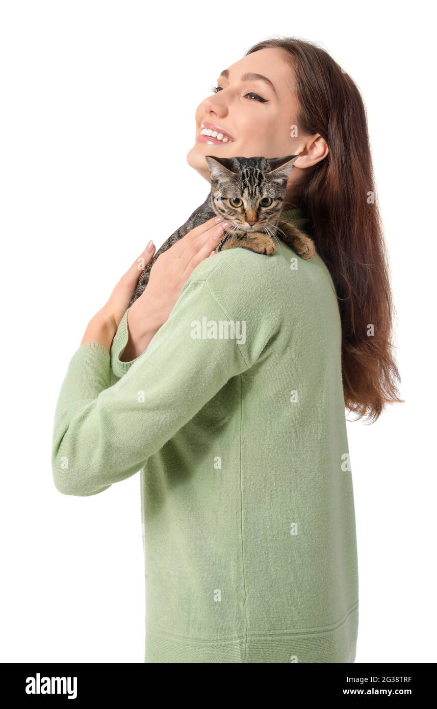 Beautiful young woman with cute cat on white background Stock Photo - Alamy