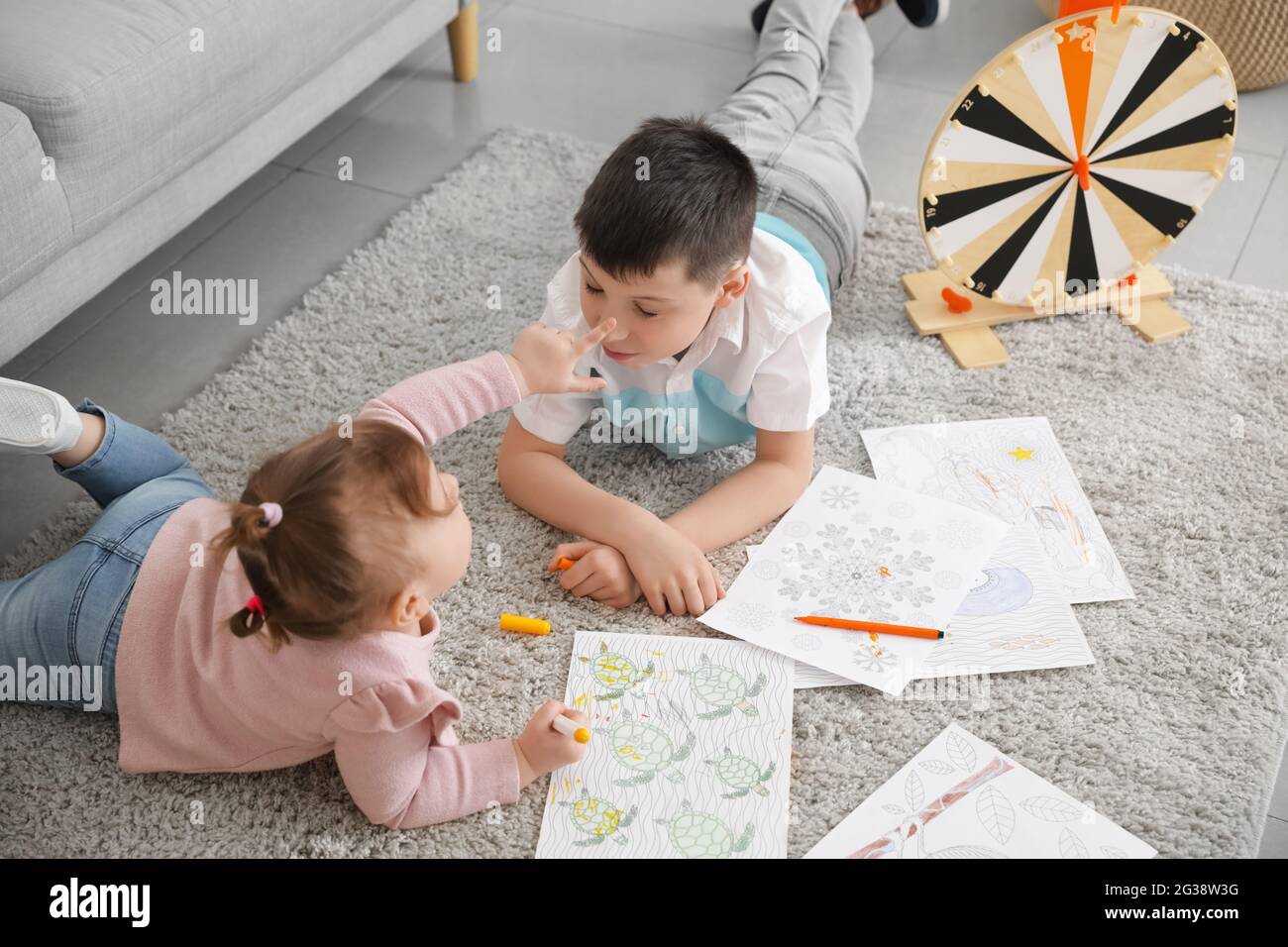 Cute little children drawing at home Stock Photo - Alamy