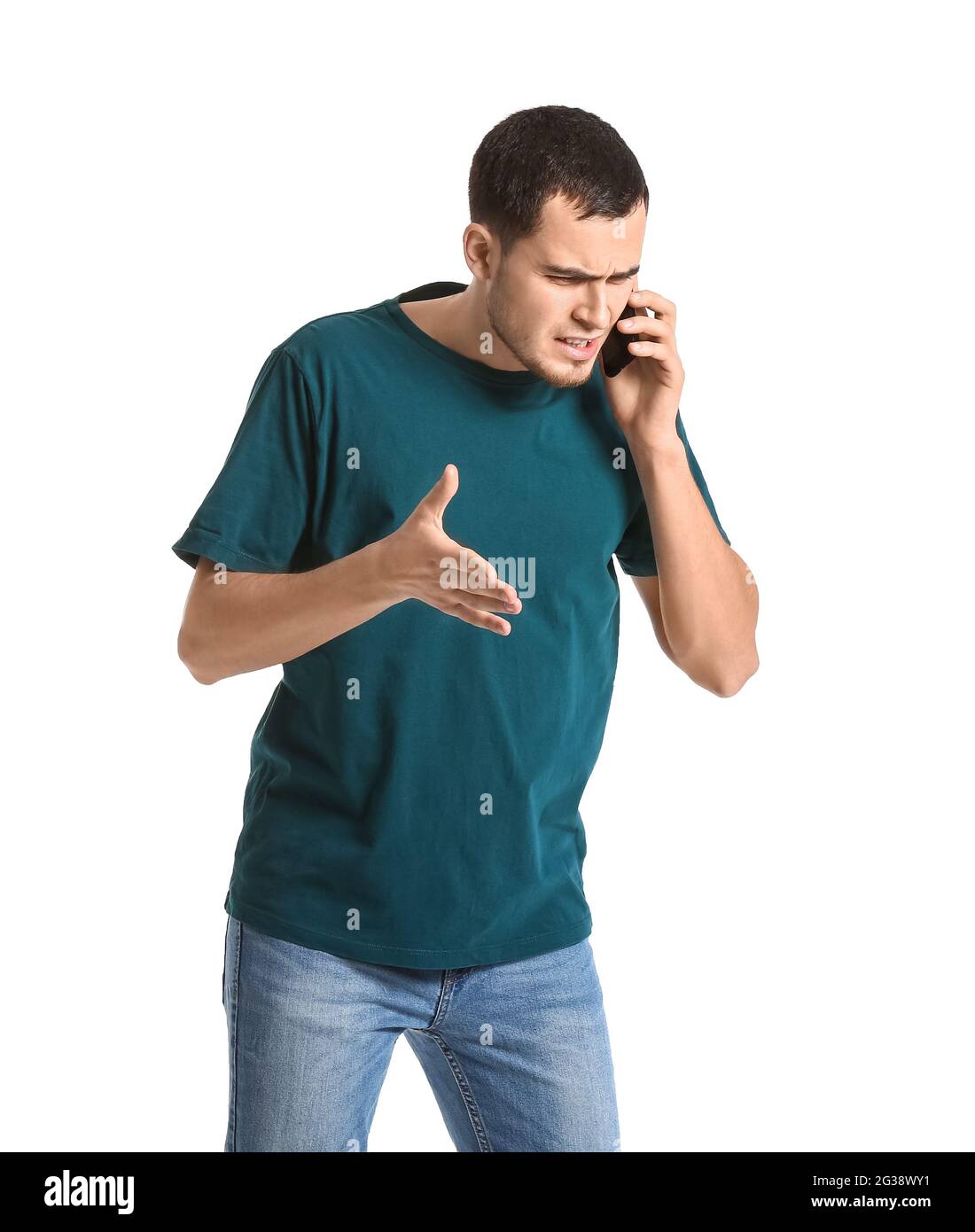 Aggressive man talking on smartphone hi-res stock photography and ...