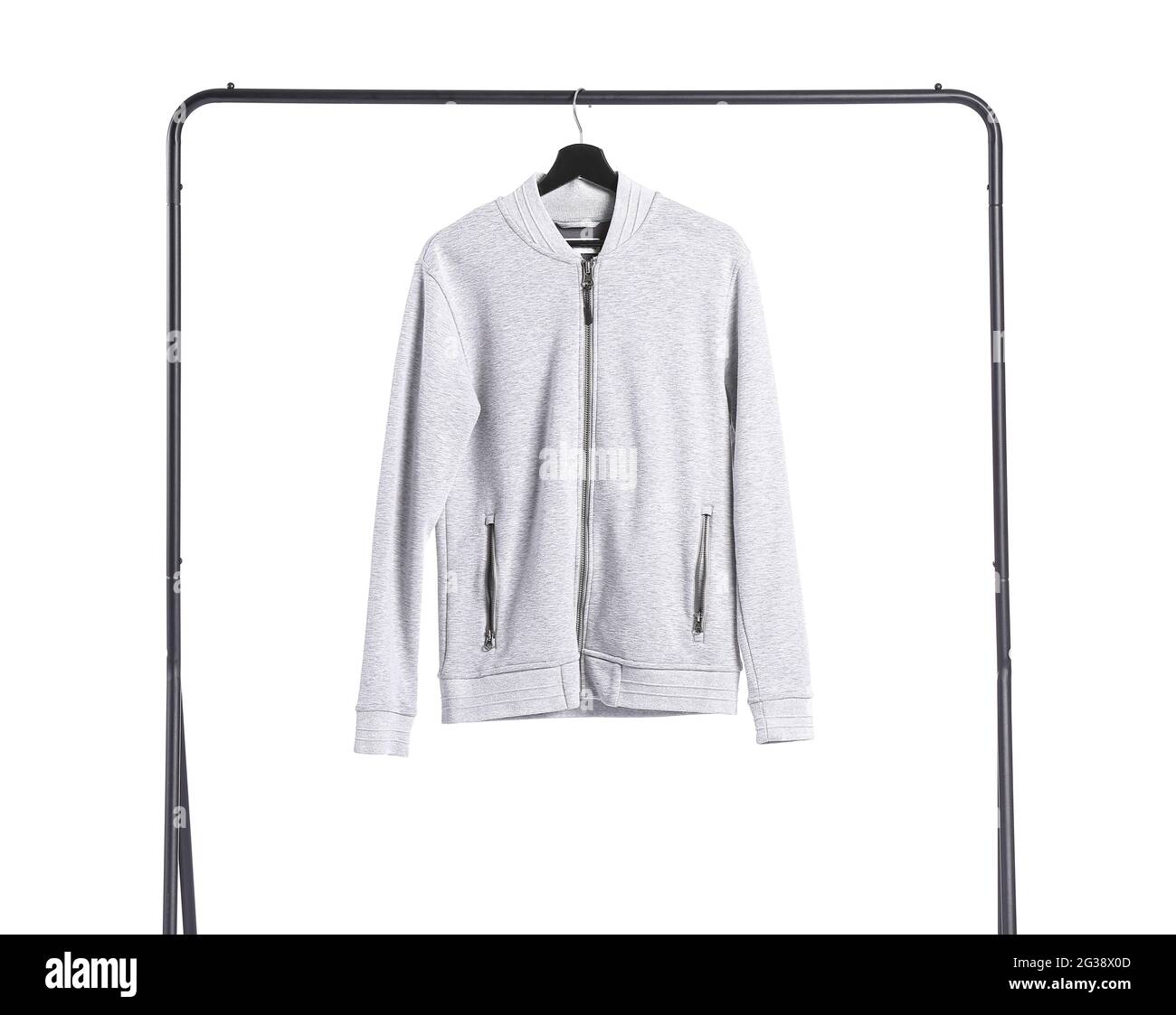 Rack with jacket on white background Stock Photo - Alamy