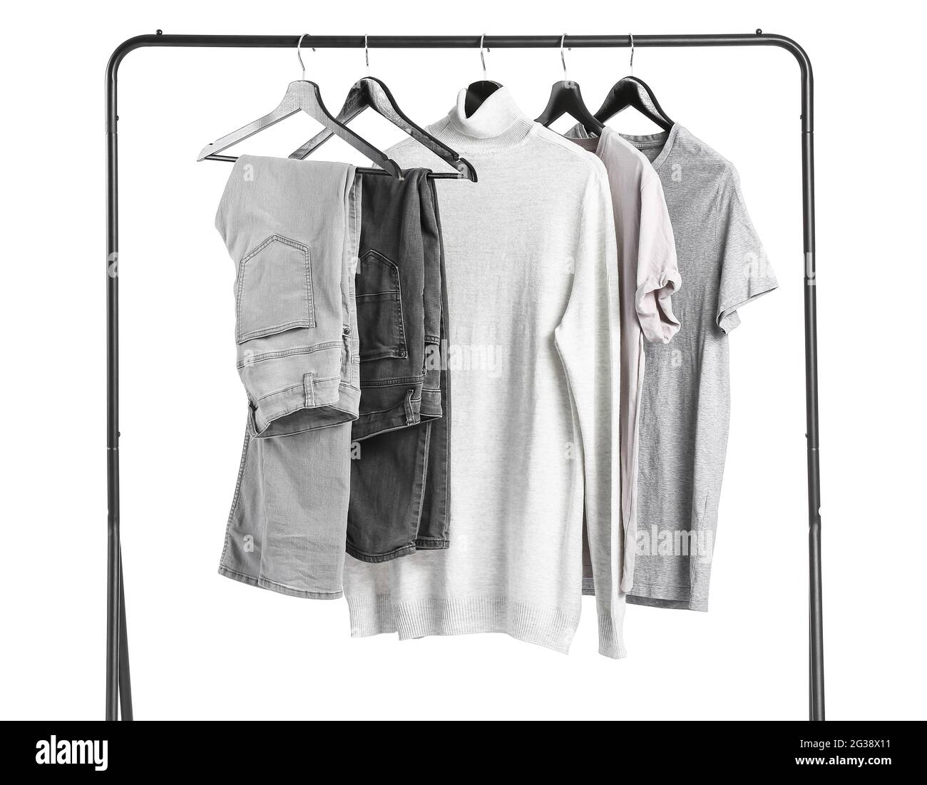 Rack with modern clothes on white background Stock Photo - Alamy
