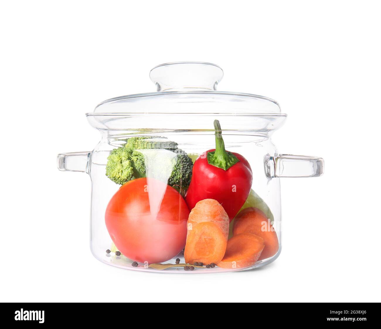 Stylish cooking pot with vegetables on white background Stock Photo - Alamy