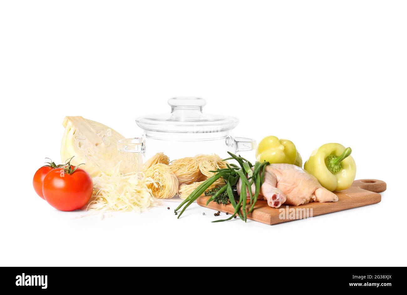 Stylish cooking pot and products on white background Stock Photo - Alamy