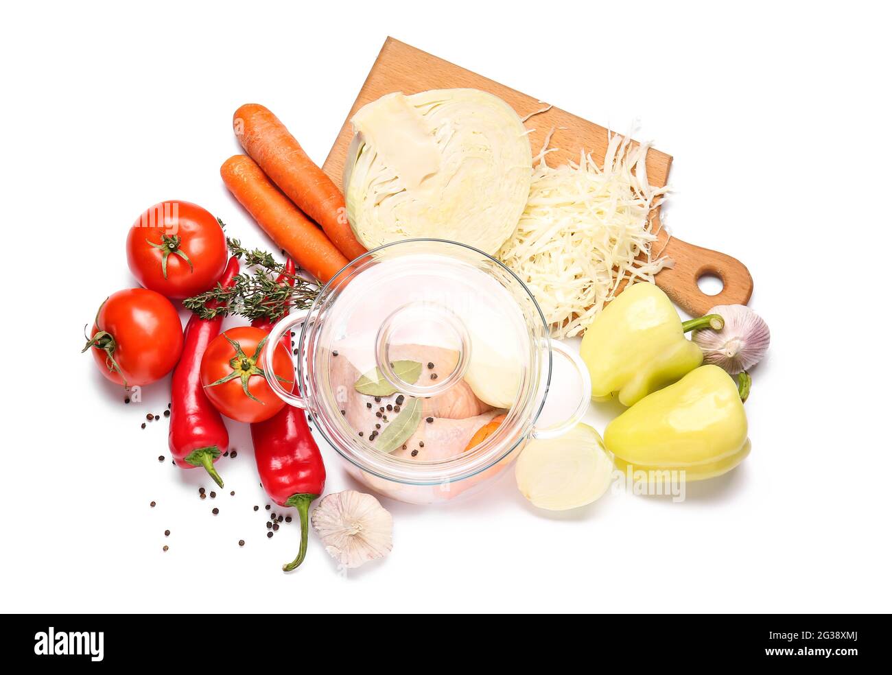 Stylish cooking pot and products on white background Stock Photo - Alamy