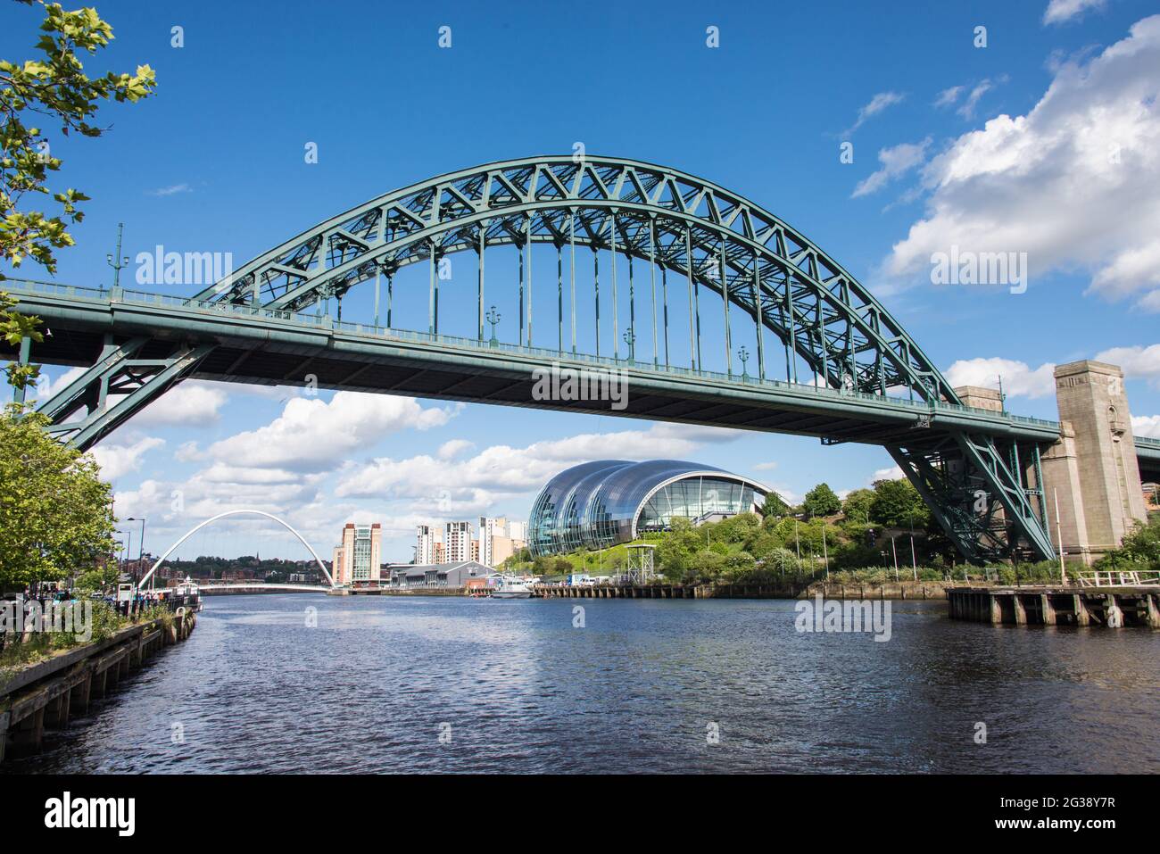 At the Tyne River promenade: A view of Tyne Bridge and the futuristic ...
