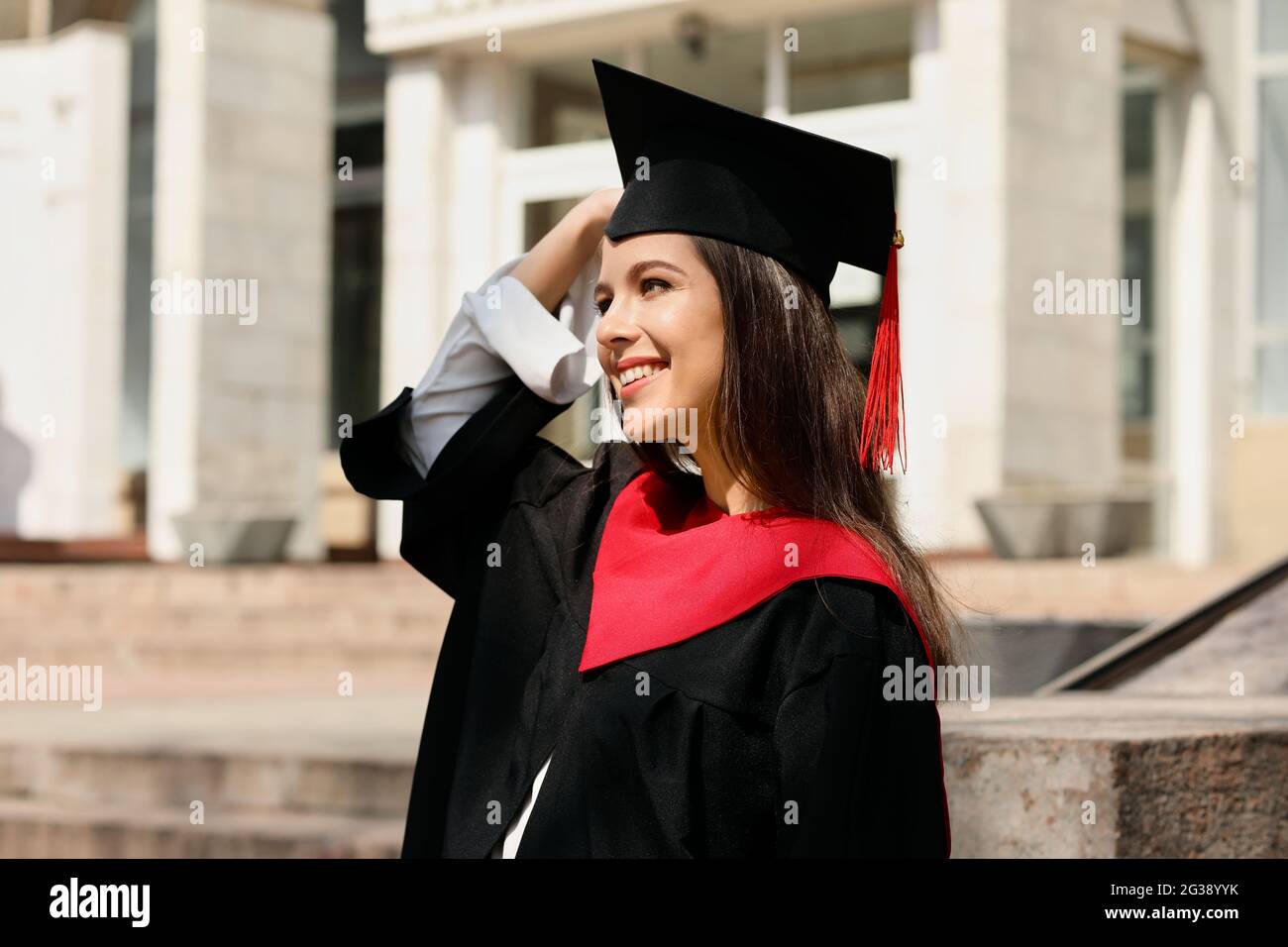 Female student in bachelor robe on her graduation day Stock Photo - Alamy