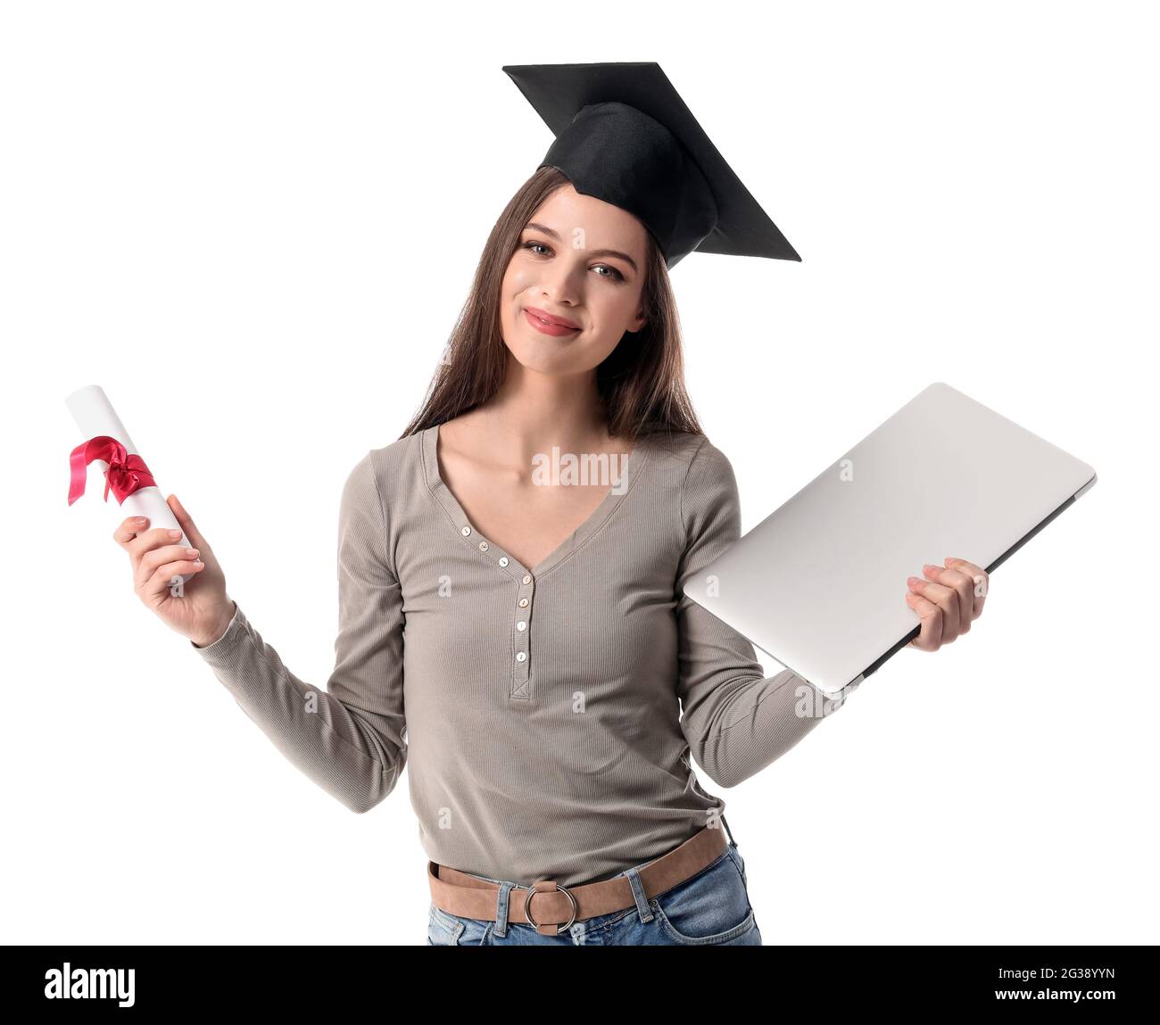 Female graduating student with diploma and laptop on white background ...
