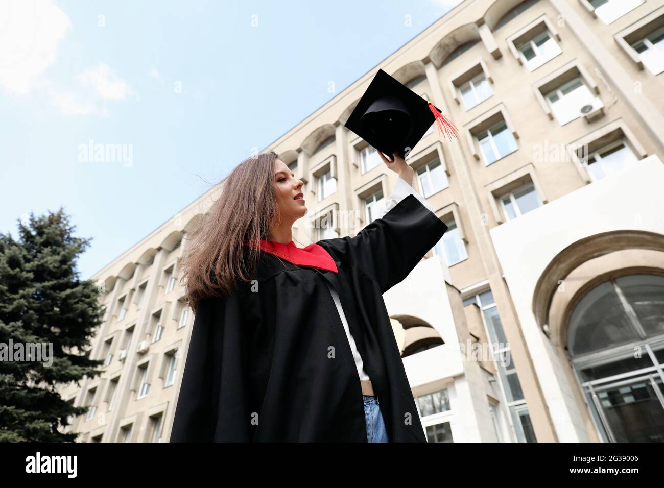Female student in bachelor robe on her graduation day Stock Photo - Alamy