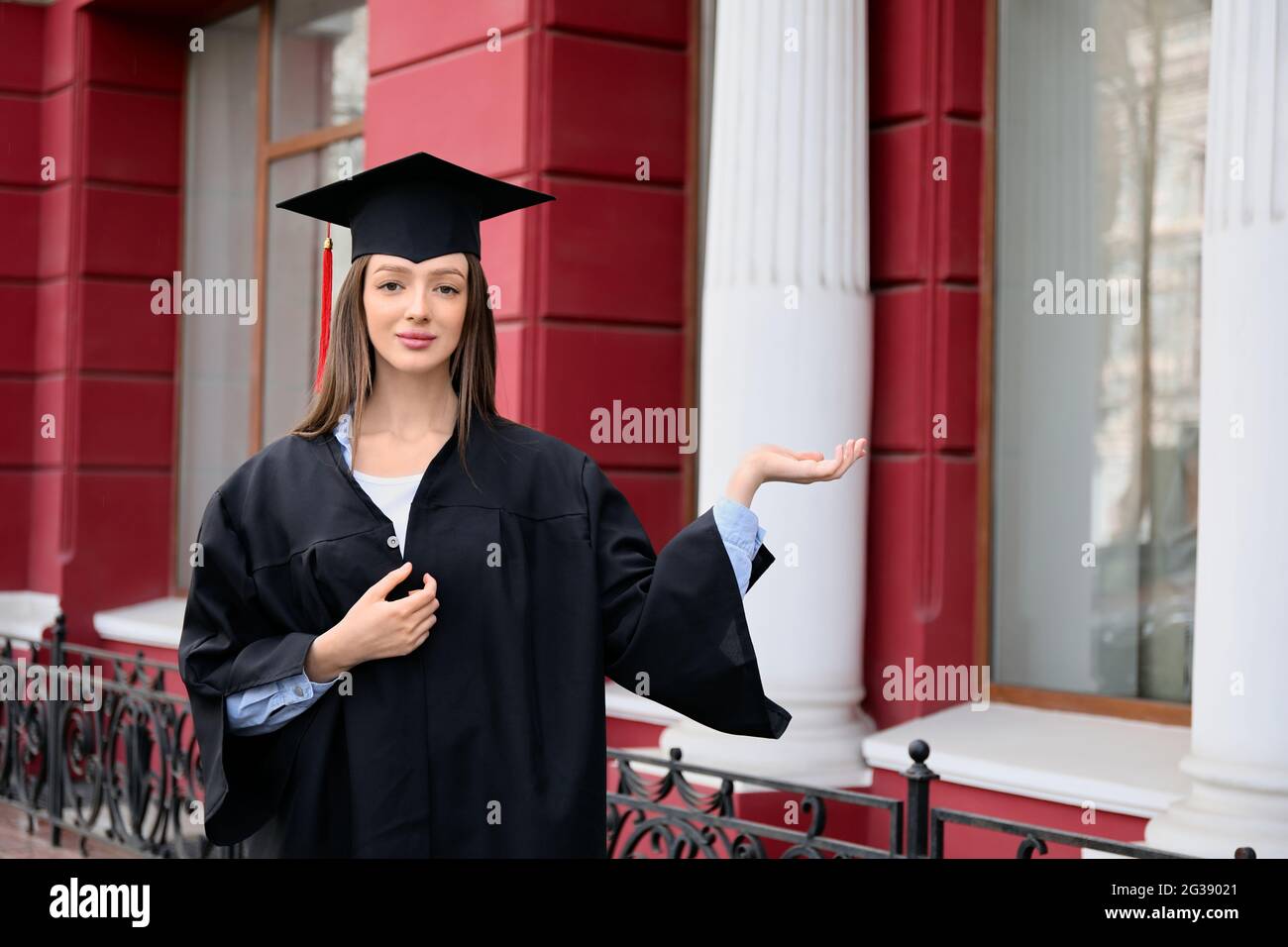 Female student in bachelor robe on her graduation day Stock Photo - Alamy
