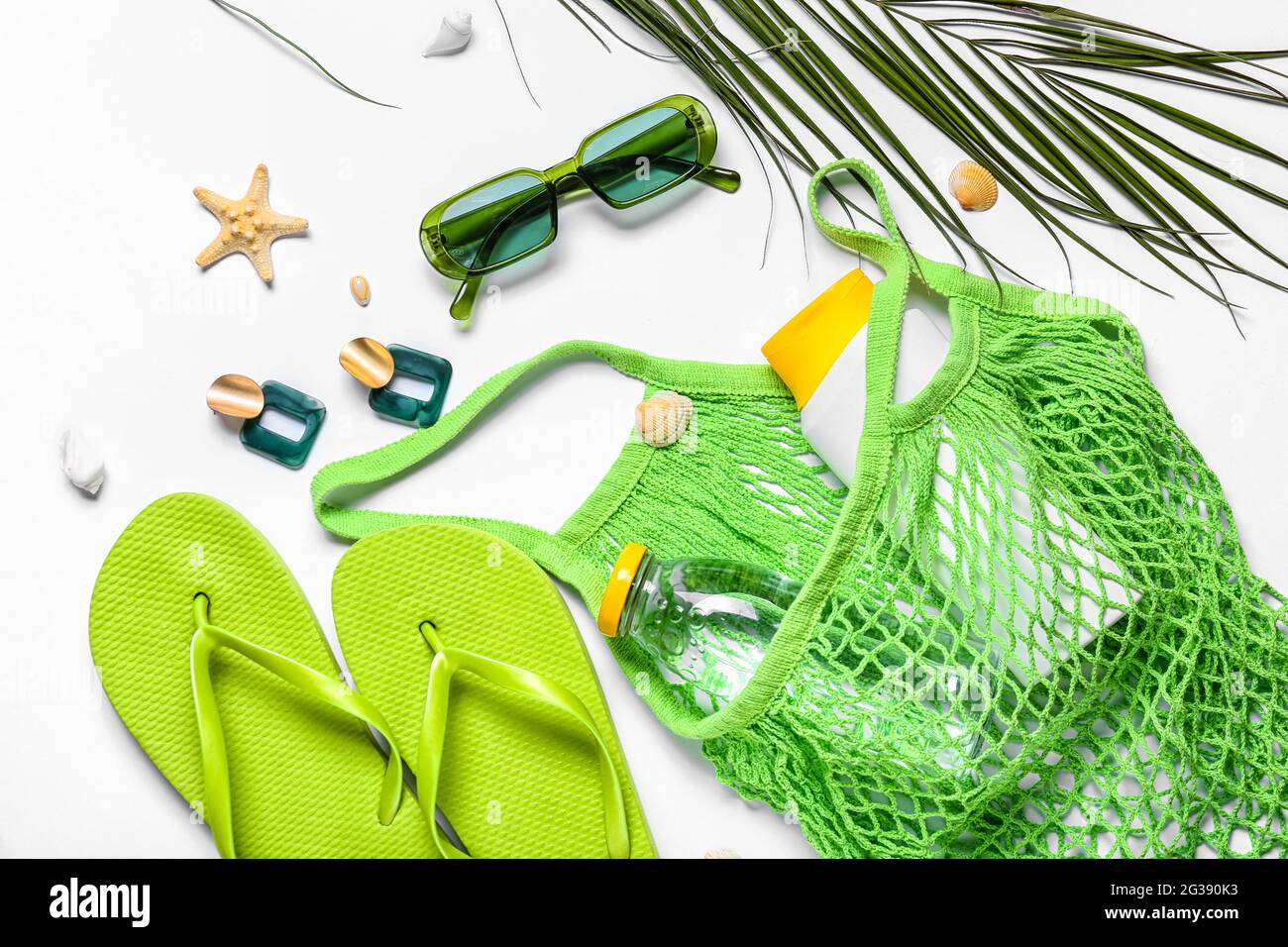 Stylish beach accessories on white background Stock Photo - Alamy