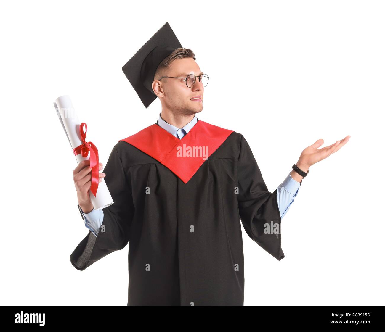 Male graduating student on white background Stock Photo - Alamy