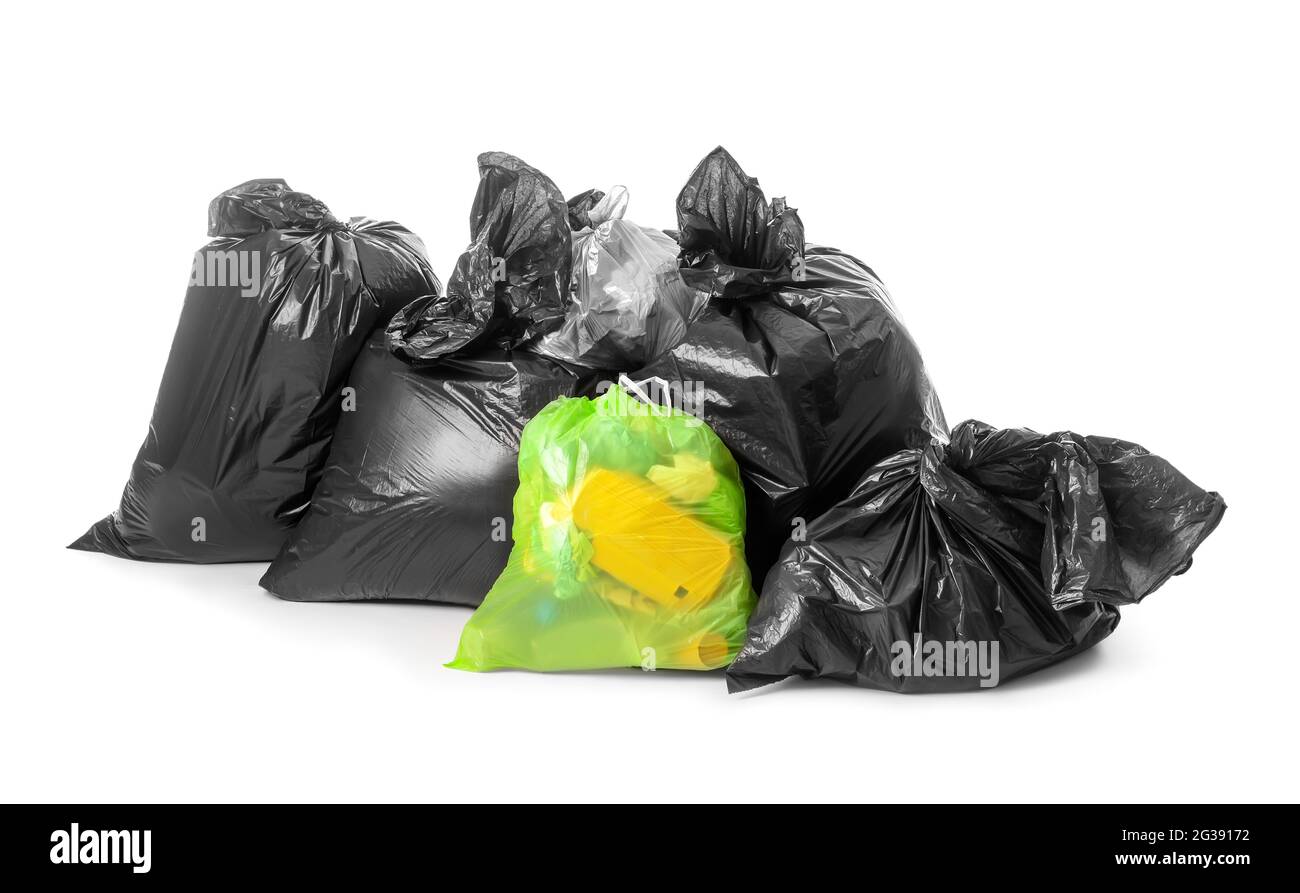 Bags with garbage on white background Stock Photo - Alamy