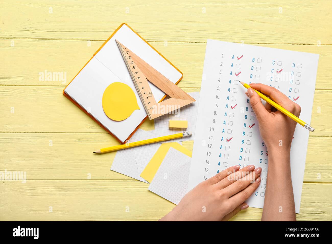 Teacher passing pencil student in hi-res stock photography and images ...