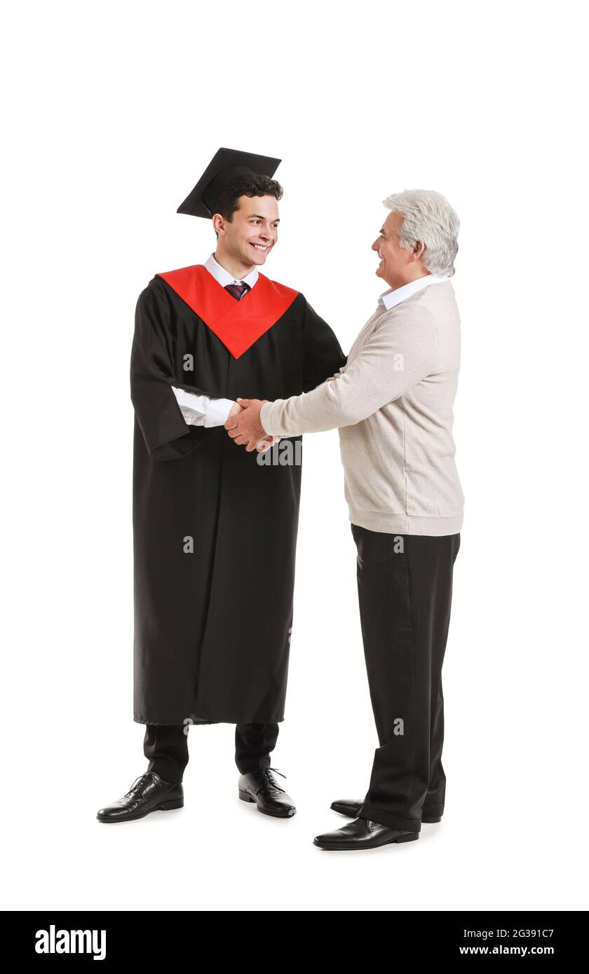 Happy male graduation student with his father on white background Stock ...