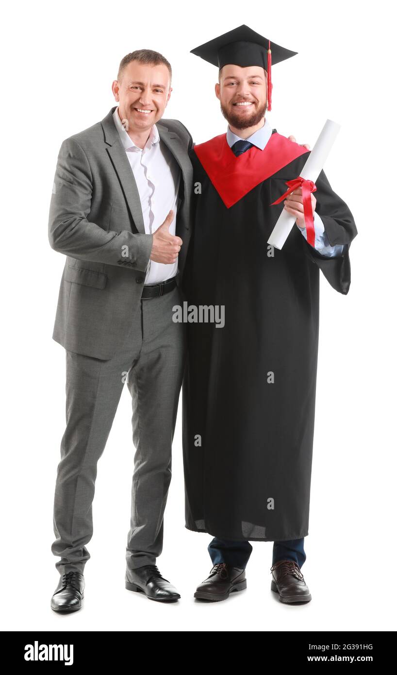 Happy male graduation student with his father on white background Stock ...