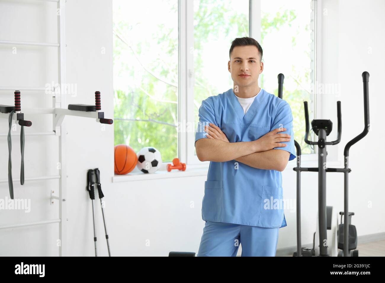 Male physiotherapist in rehabilitation center Stock Photo - Alamy