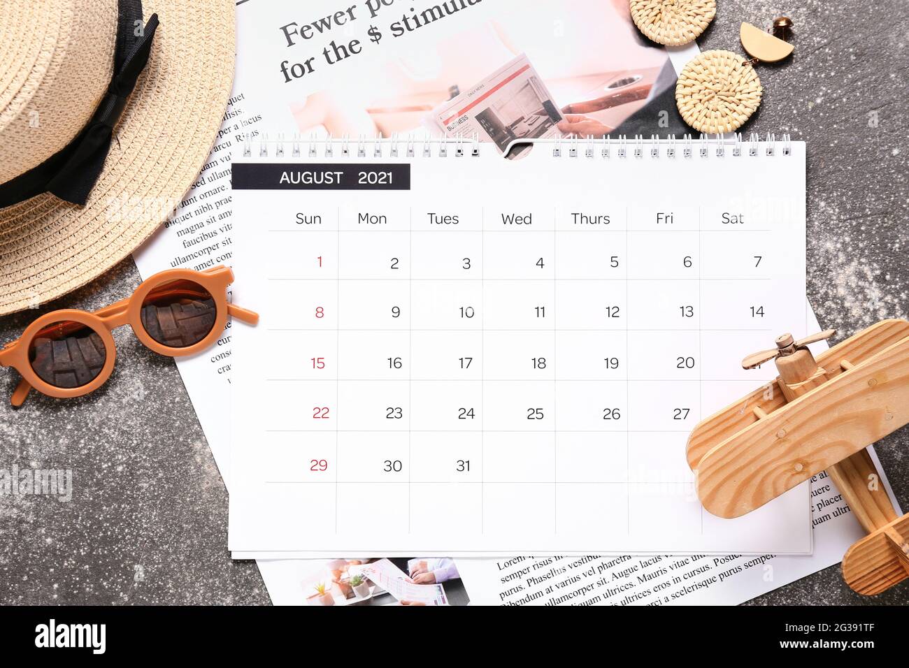Calendar, newspaper and female accessories on grunge background Stock ...