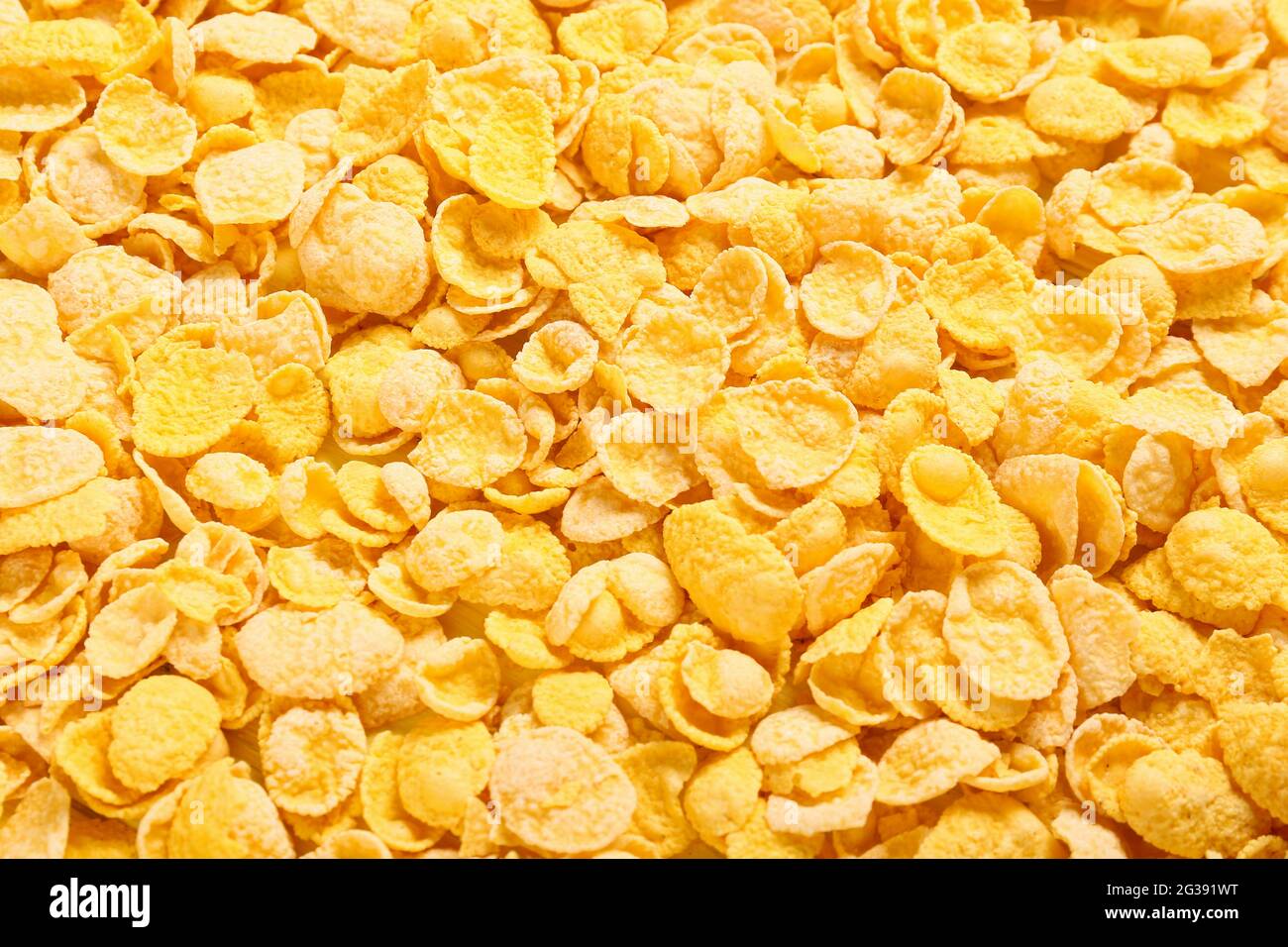 Tasty corn flakes as background, closeup Stock Photo - Alamy