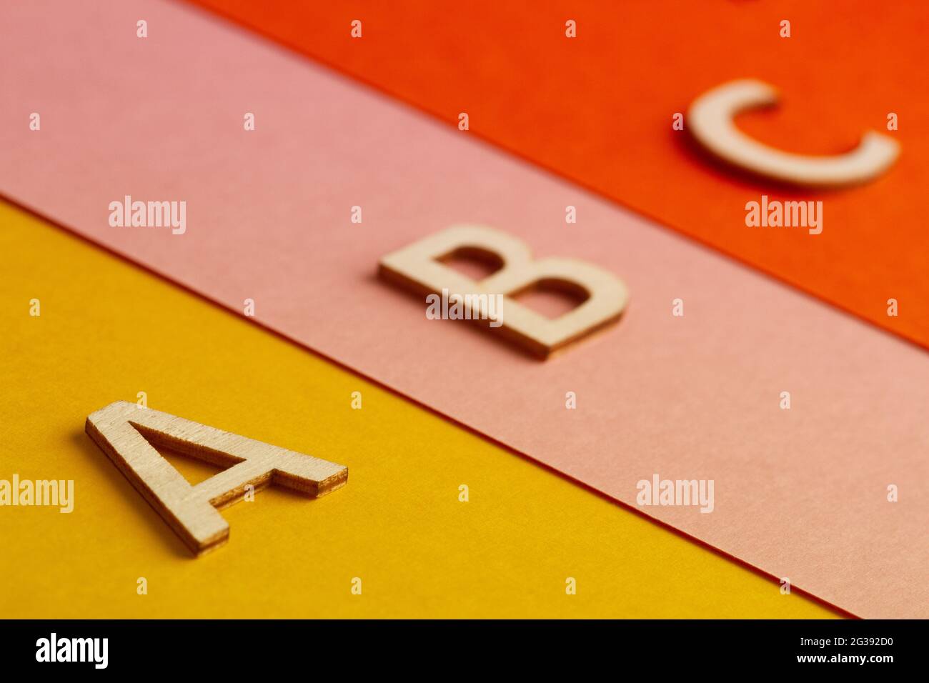 side view perspective closeup of A B and C letters of the alphabet cut ...