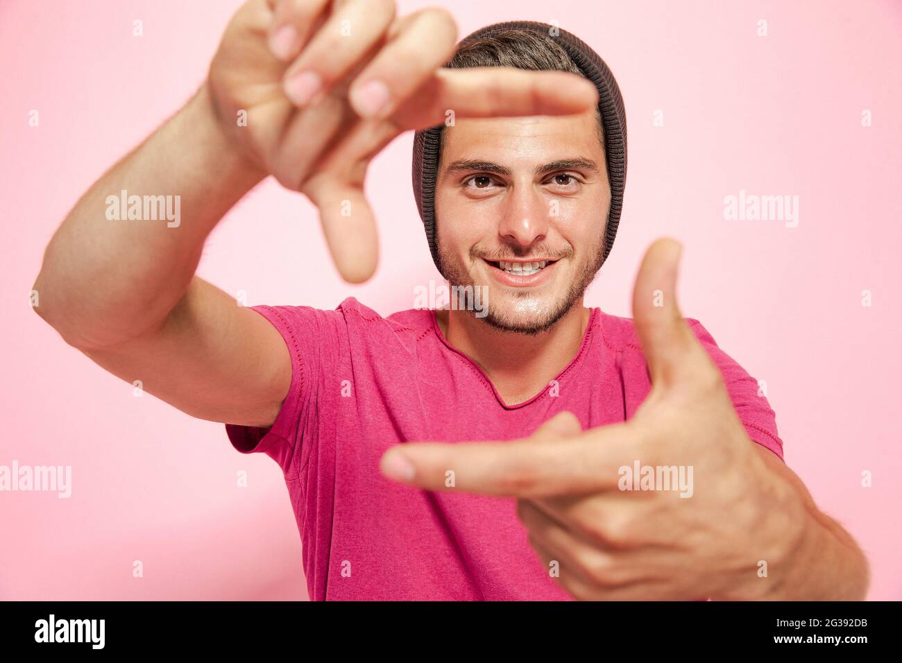 Creative happy positive man good mood wear shirt make fingers frame ...