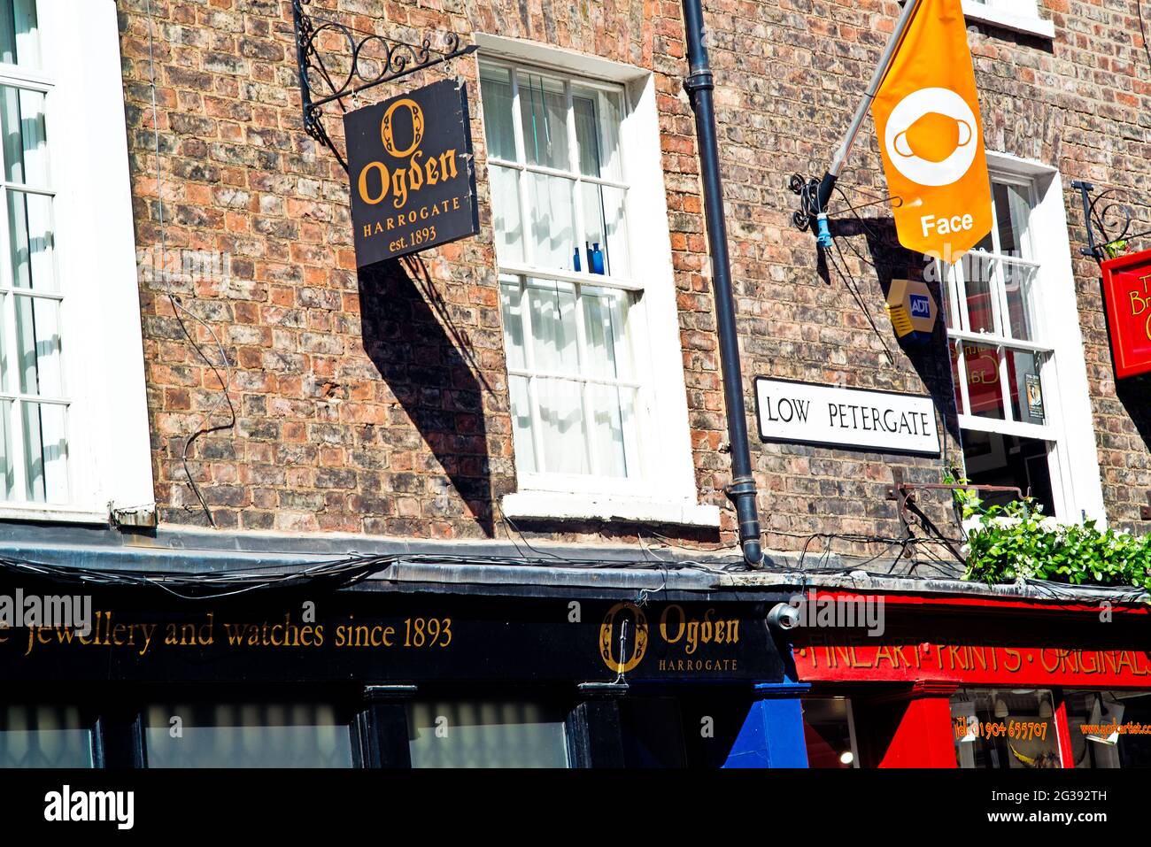 Low Petergate, shops Signs, York, England Stock Photo - Alamy